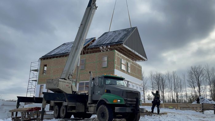 Craning an Assembled Roof Onto Walls - GreenBuildingAdvisor