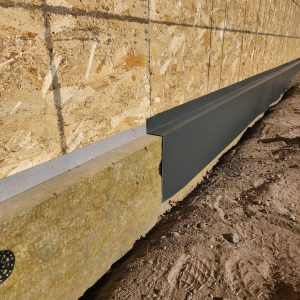 Exterior Comfort Board continuing from below grade, up the sheathing ...